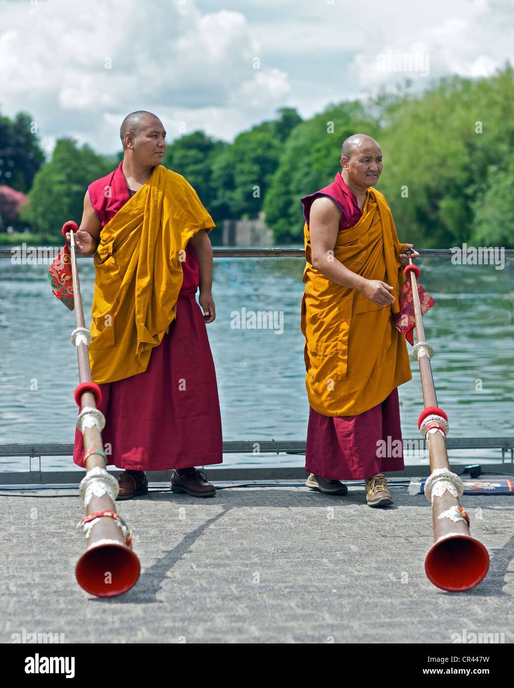 Tibetan monks performing music and dance Stock Photo - Alamy