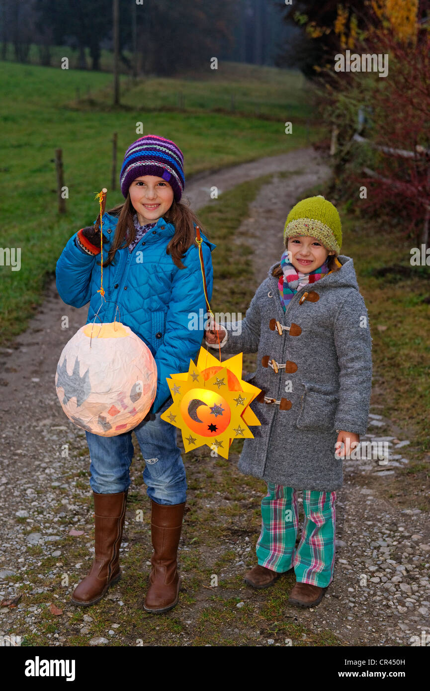 Girls carrying lanterns at a St. Martin's parade, lantern procession ...