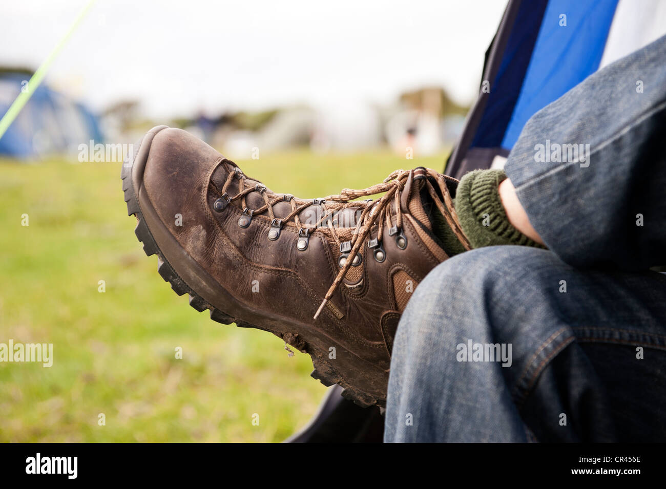 Man's walking boot from inside tent Stock Photo - Alamy