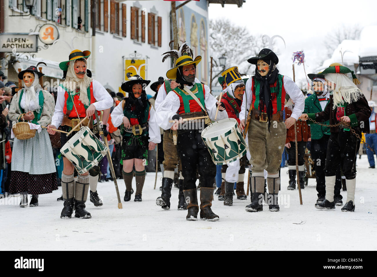 Men dressed in traditional carnival costumes, carnival parade ...