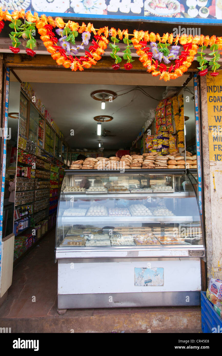 Food shops in Calangute high Street Stock Photo - Alamy