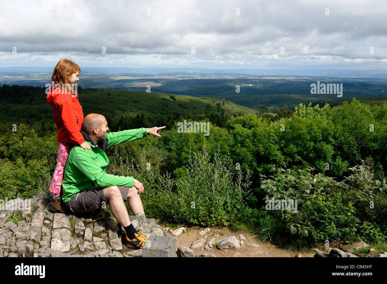 Hikers on the rocks of Koenigsstuhl, Donnersberg Mountain, highest peak ...