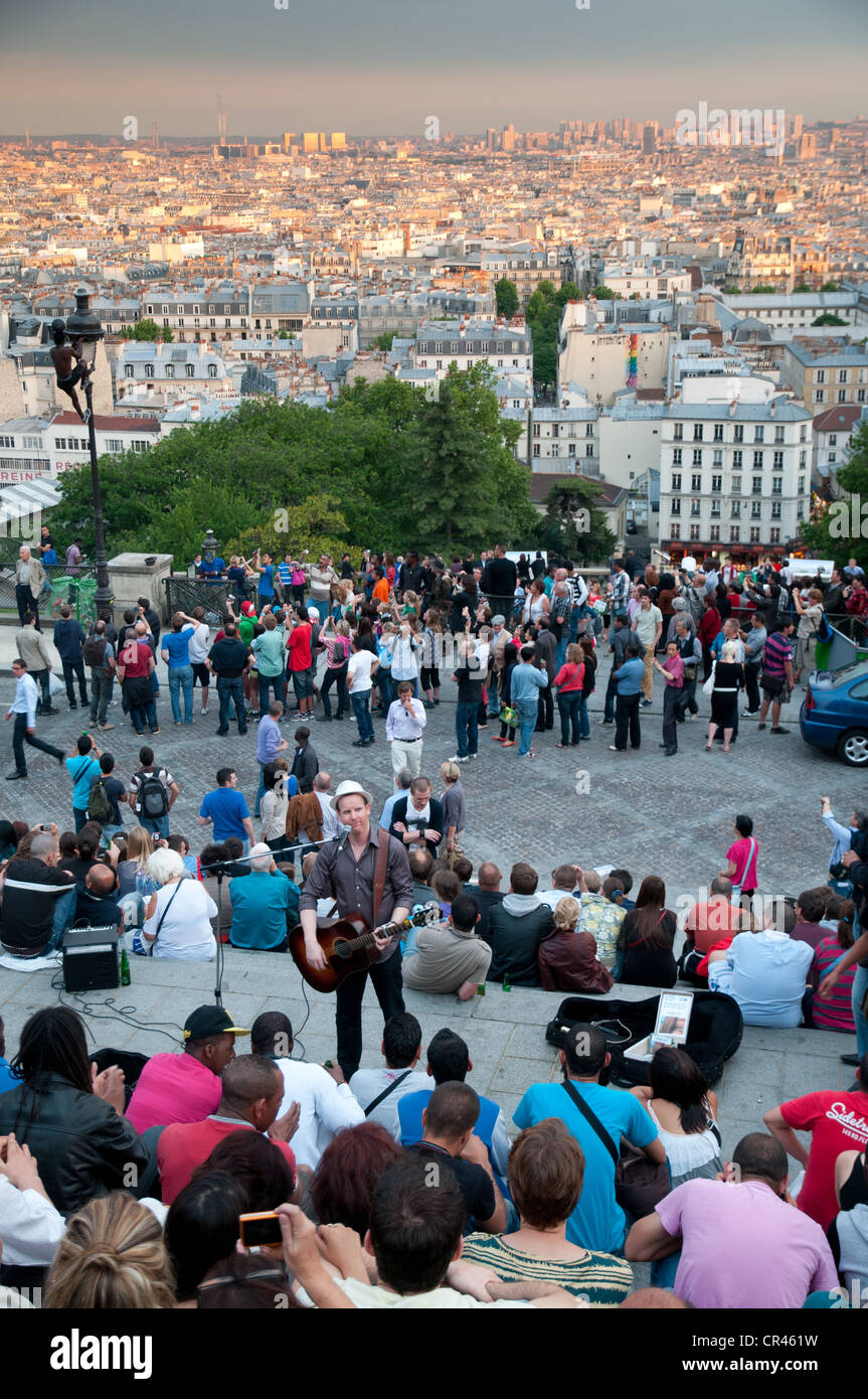 People watching street musician in hi-res stock photography and images ...