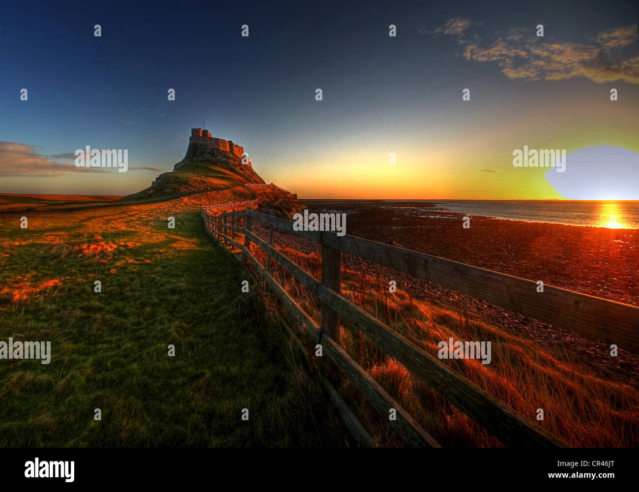 Lindisfarne at dawn Stock Photo - Alamy