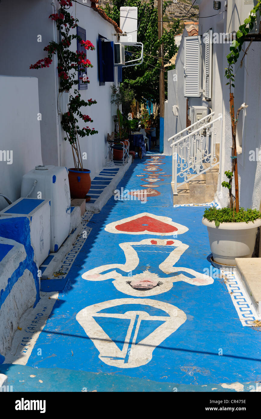 Narrow street in the port city of Pythagorio, Samos Island, Aegean Sea ...