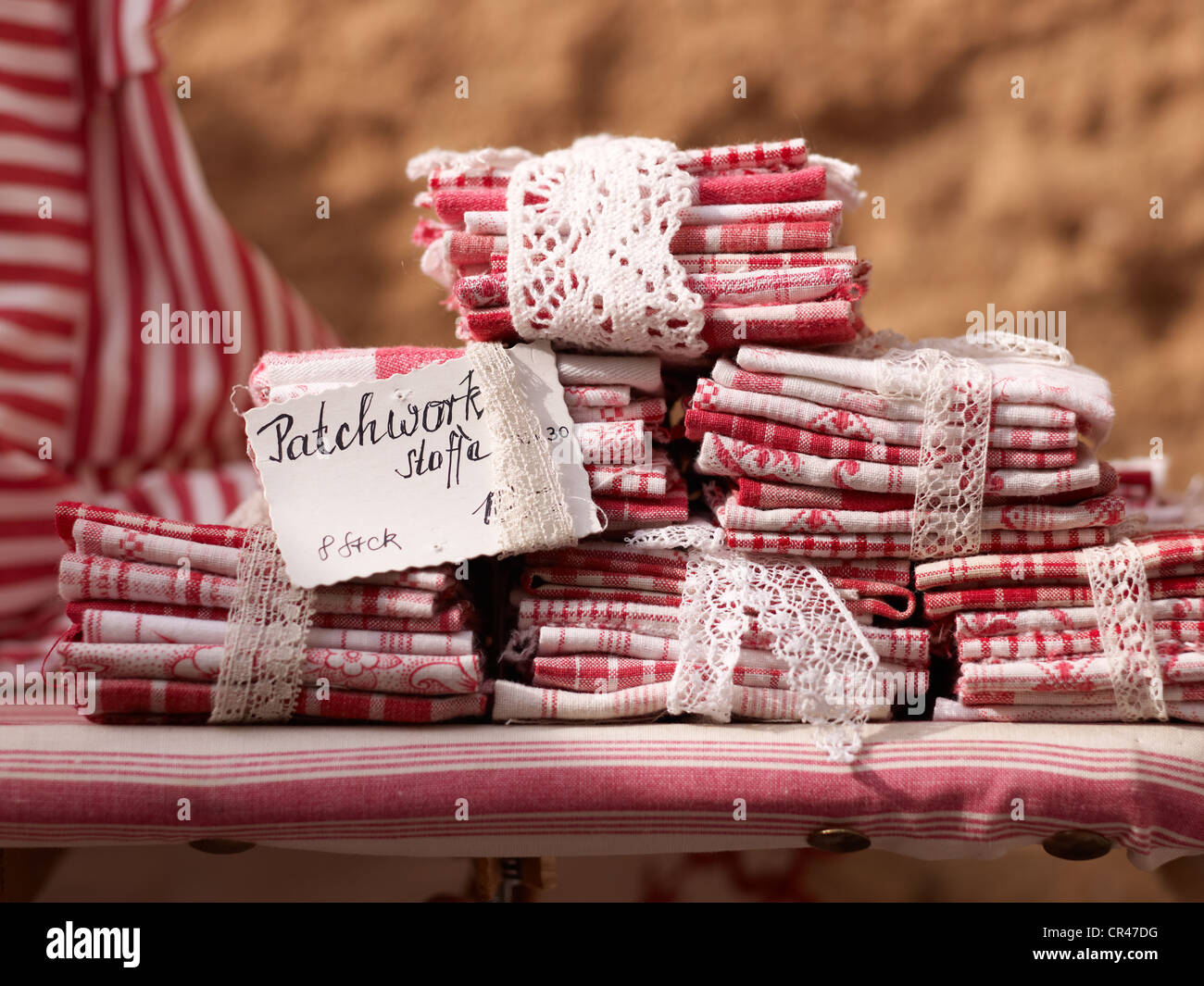 Patchwork fabrics on a craft market at a garden festival at Schloss ...