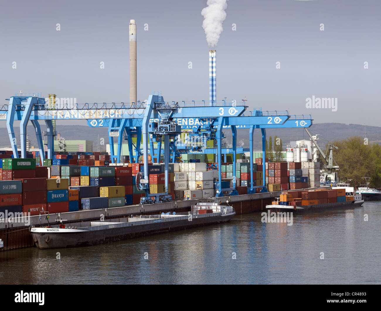 Loading bridges with containers and ships in the container terminal ...