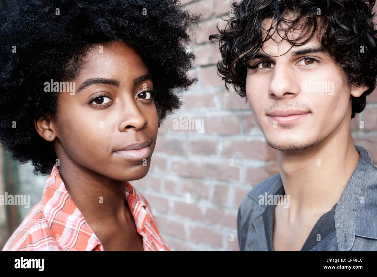 Friends standing together Stock Photo - Alamy