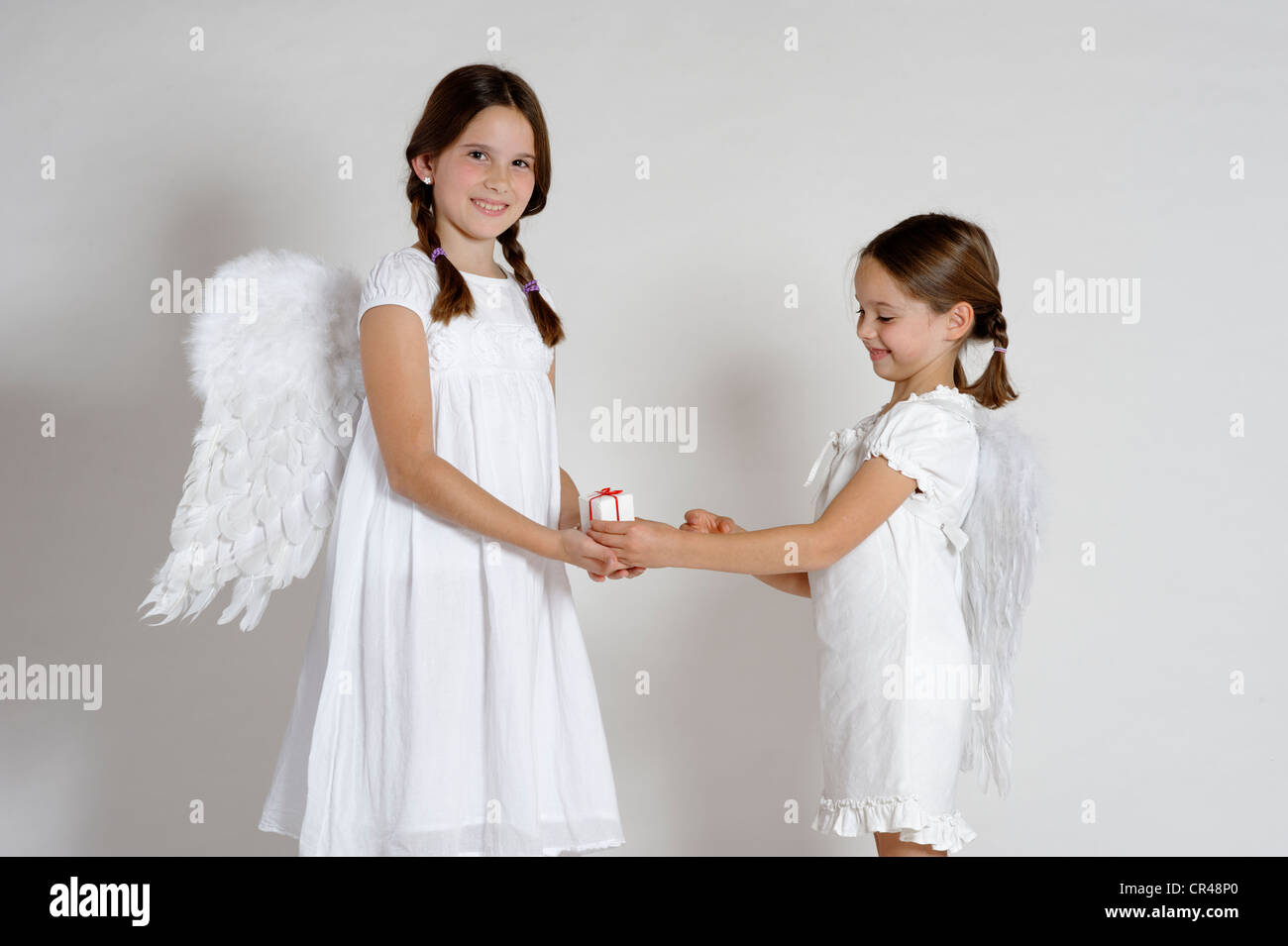 Two Angels Holding Hands