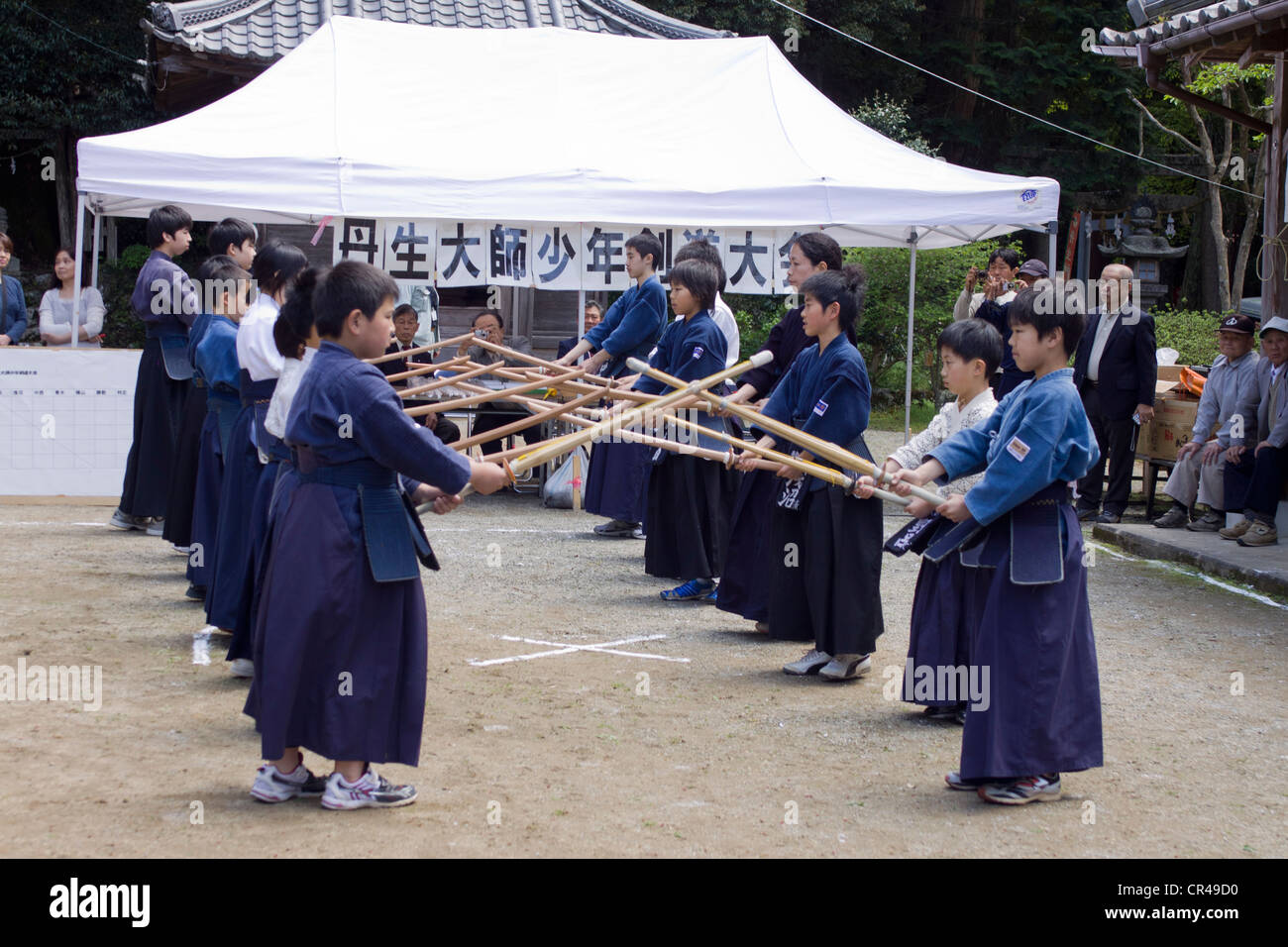 Young Japanese children participate in the local Kendo championships in ...