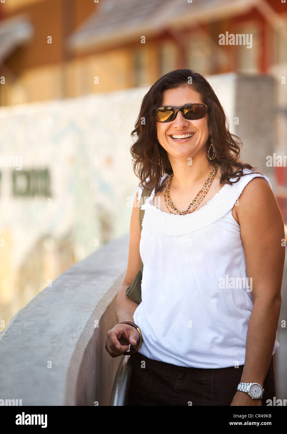 Smiling Hispanic woman Stock Photo - Alamy