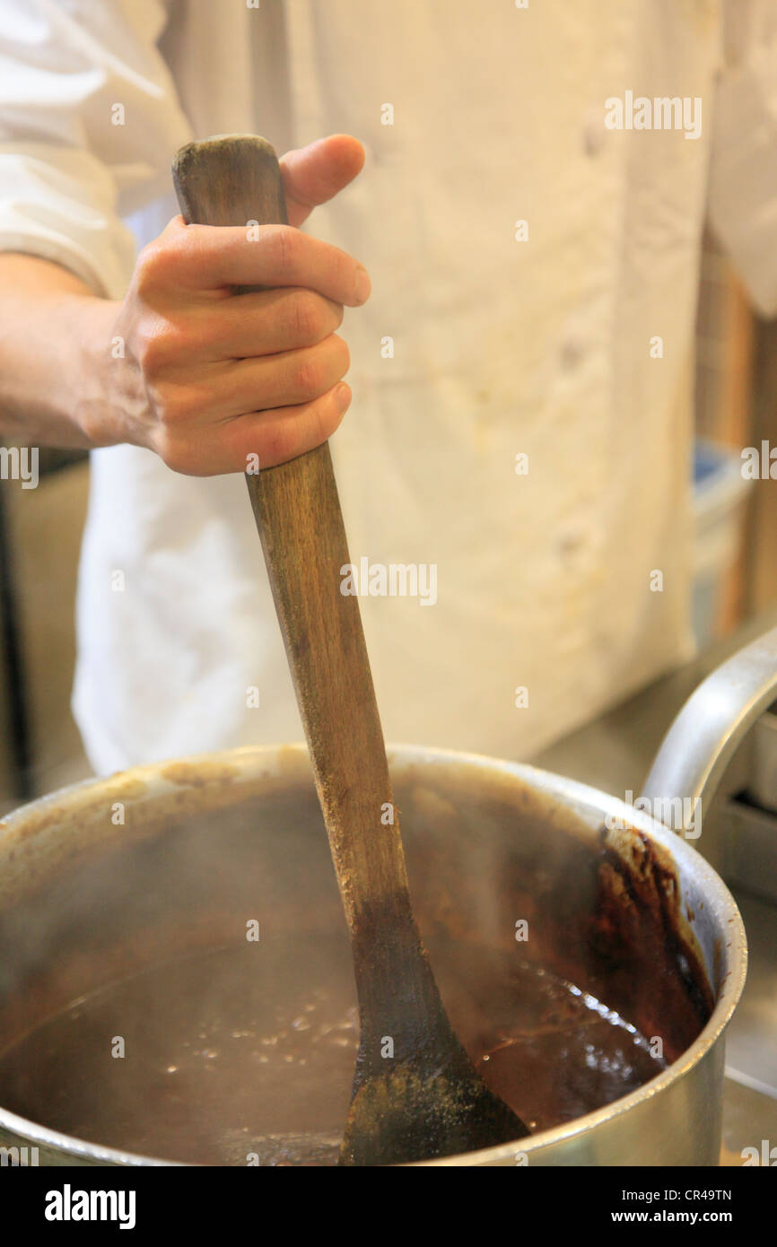 Chef Stirring Stew in Pot Stock Photo - Alamy
