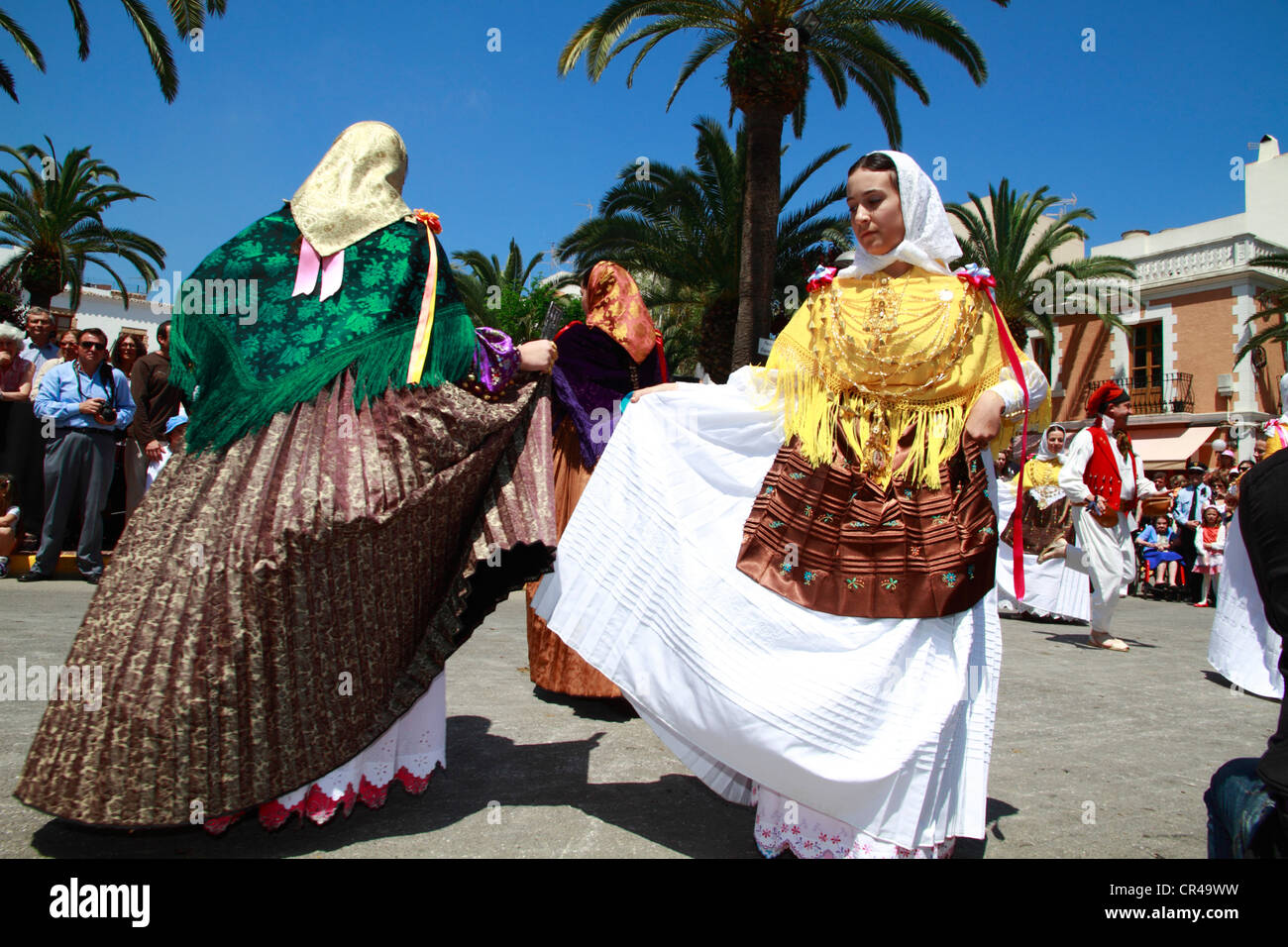 Members of a folklore group in traditional costume performing typical ...