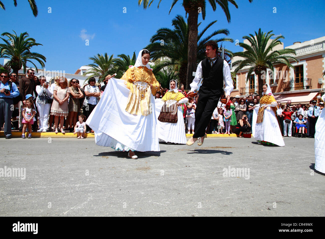 Members of a folklore group in traditional costume performing typical ...