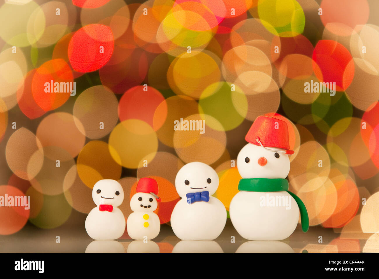 Row of snowmen hi-res stock photography and images - Alamy