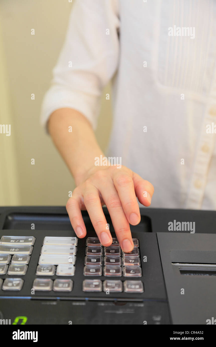 Mature Adult Man Using Cash Register Stock Photo - Alamy
