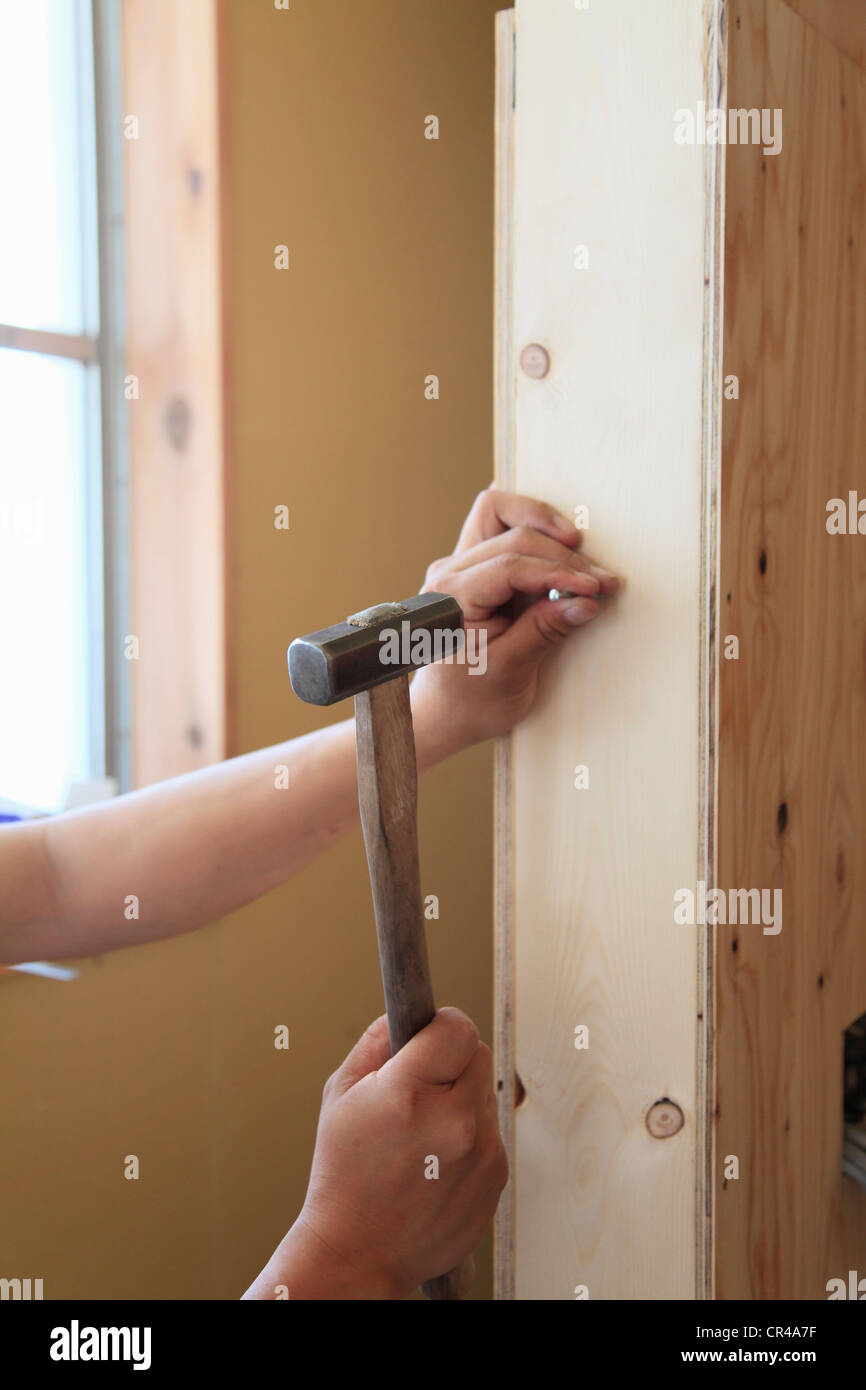 Human hammer hi-res stock photography and images - Alamy