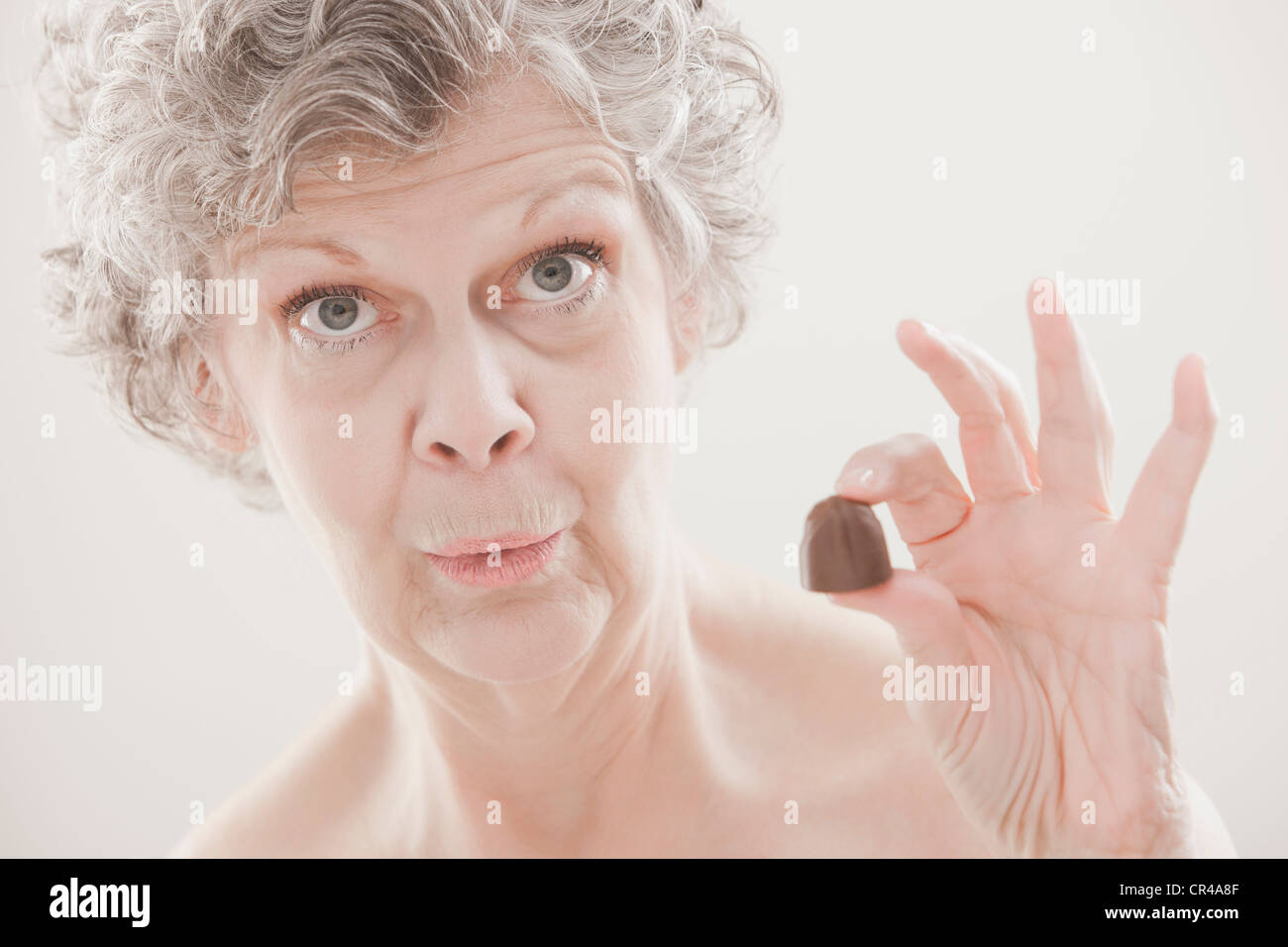 Woman making chocolate truffle hi-res stock photography and images - Alamy
