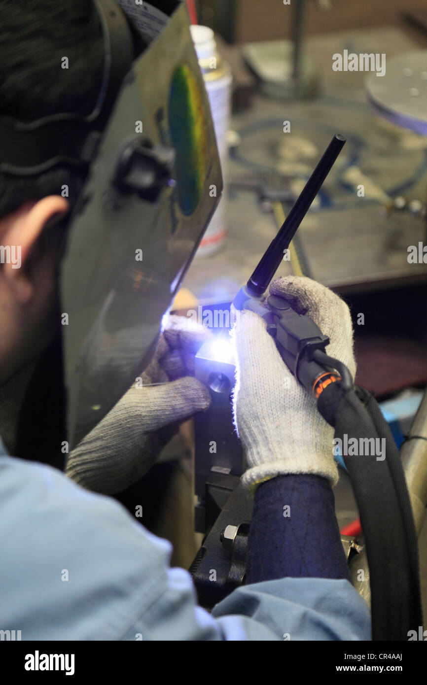 Machinery Mechanic Using Welding Machine Stock Photo - Alamy