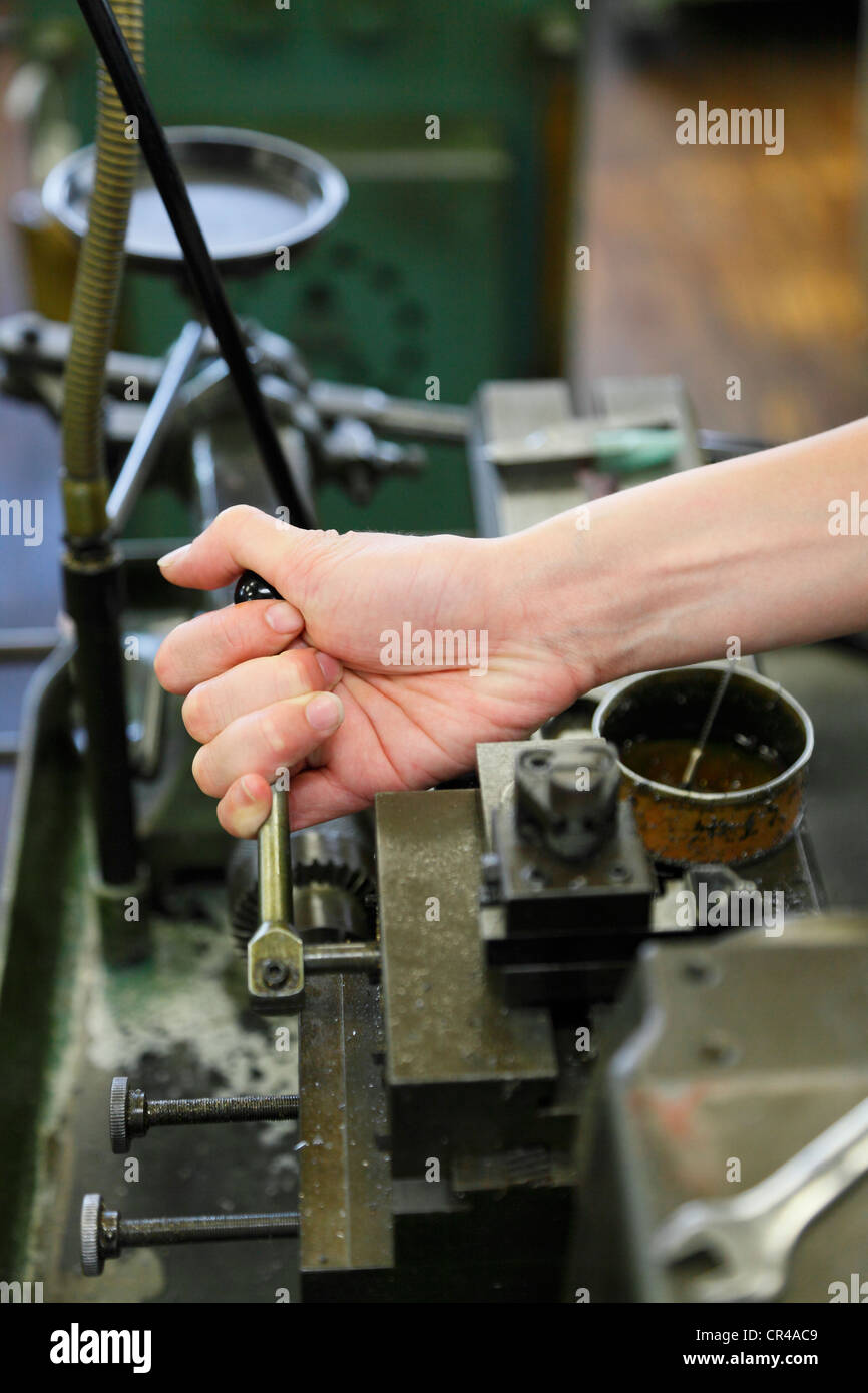 Handle by machine hi-res stock photography and images - Alamy