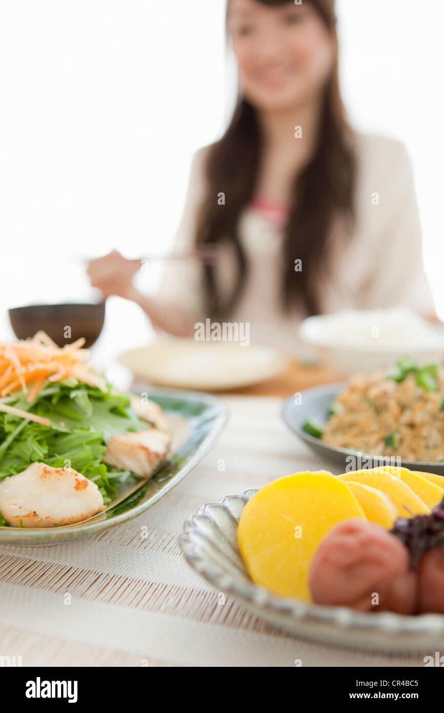 Young Woman Eating Breakfast Stock Photo - Alamy