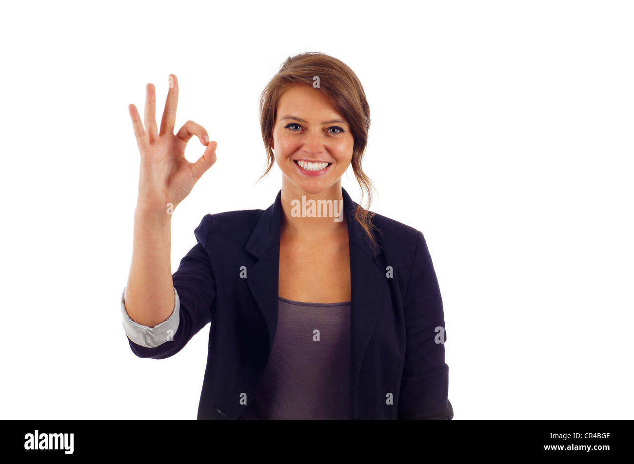 Smiling business woman showing okay sign isolated over white background Stock Photo - Alamy