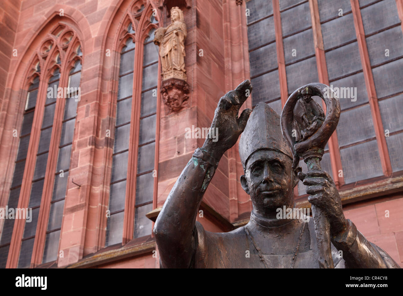 Statue of Bishop Burchard von Worms, Gothic southern portal at back ...