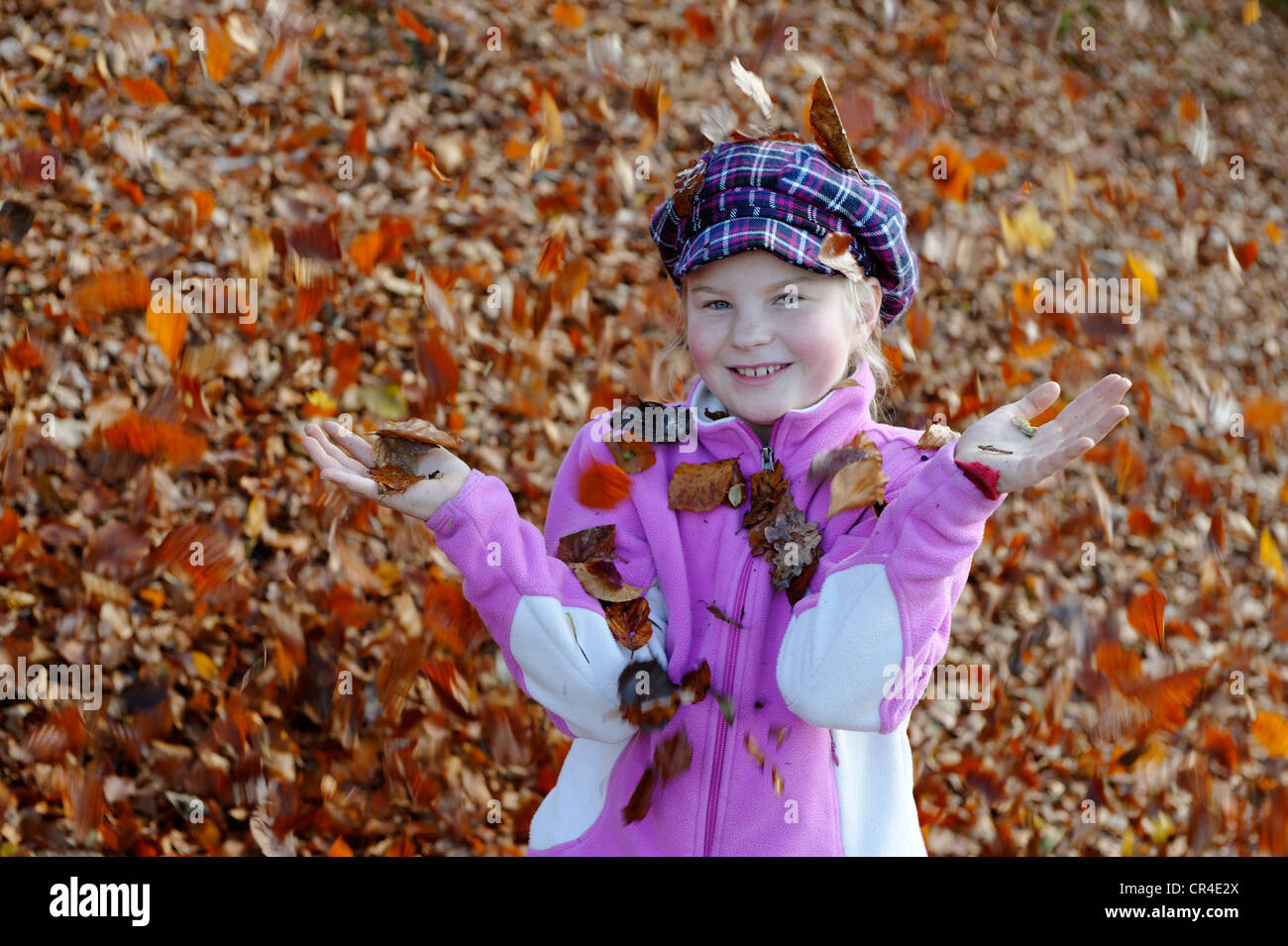 Kids autumn leaves hi-res stock photography and images - Alamy