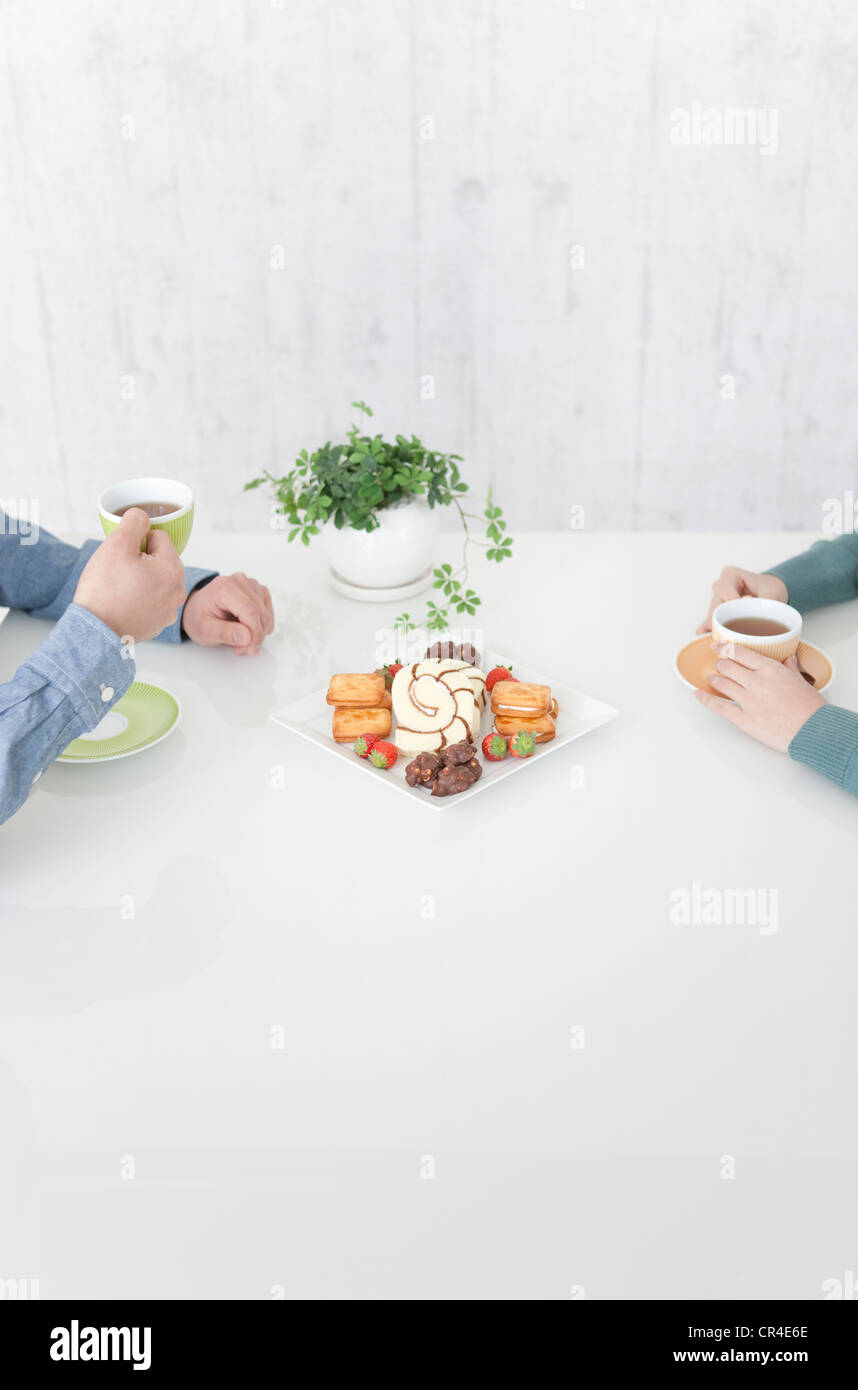 Young Couple Having Snack Stock Photo - Alamy