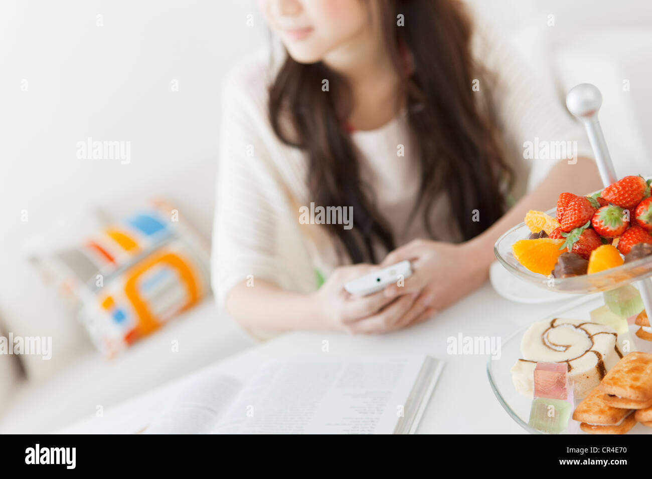 Young japanese woman texting text hi-res stock photography and images ...