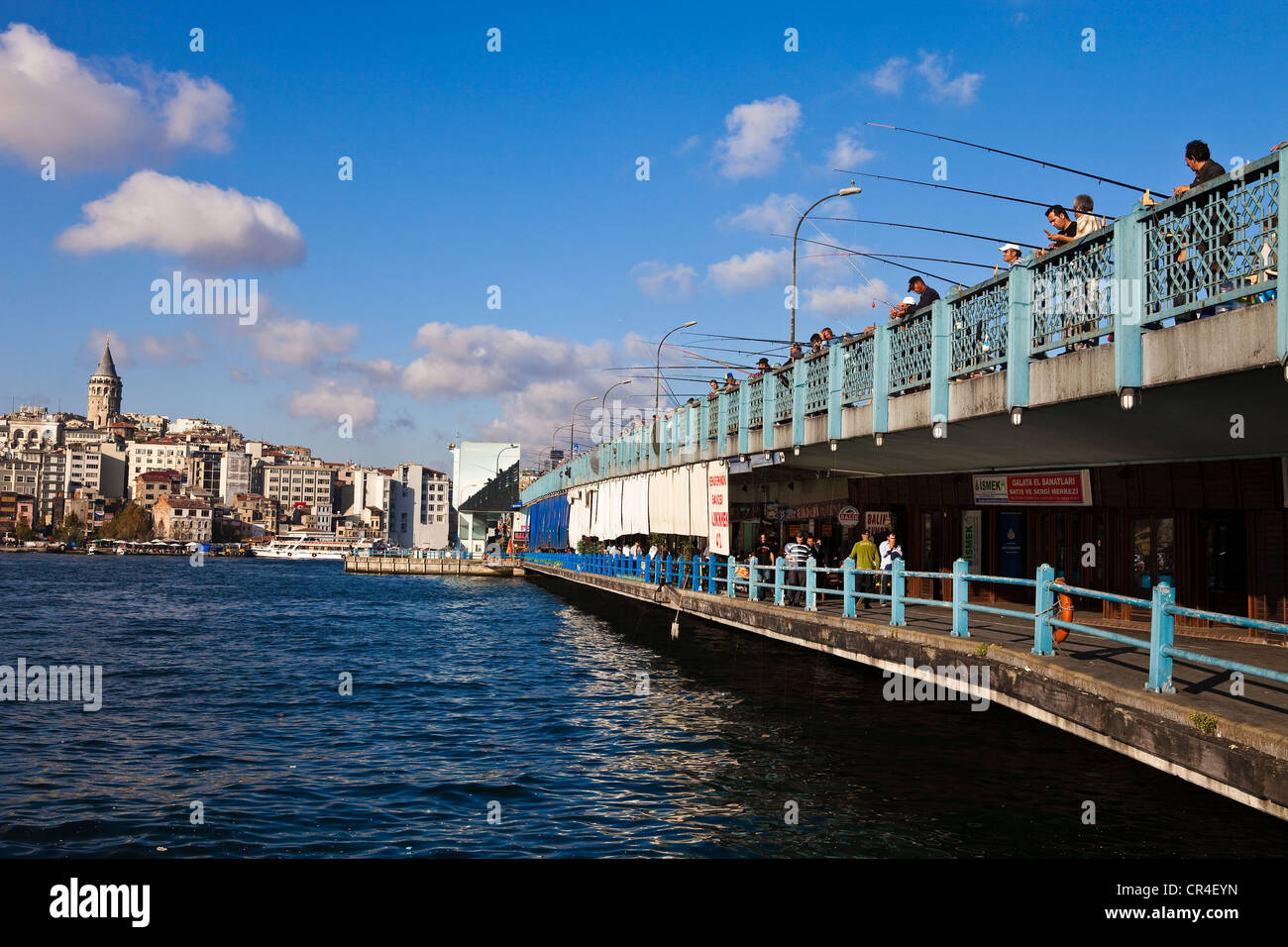 Man fishing on galata bridge hi-res stock photography and images - Alamy