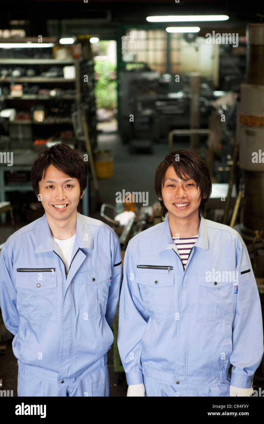 Young Male Factory Workers Stock Photo - Alamy