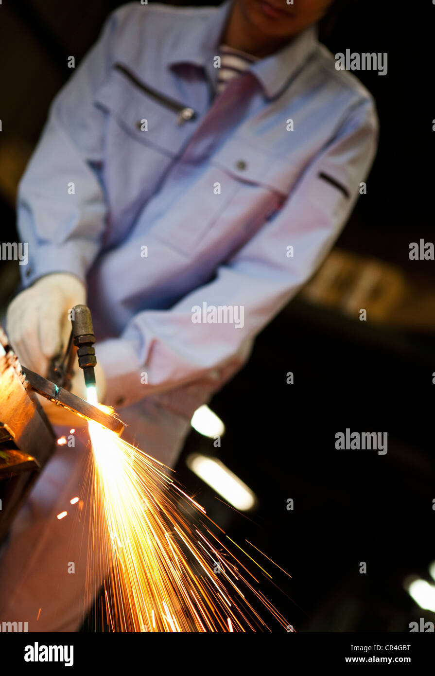 Male Worker Welding Stock Photo - Alamy