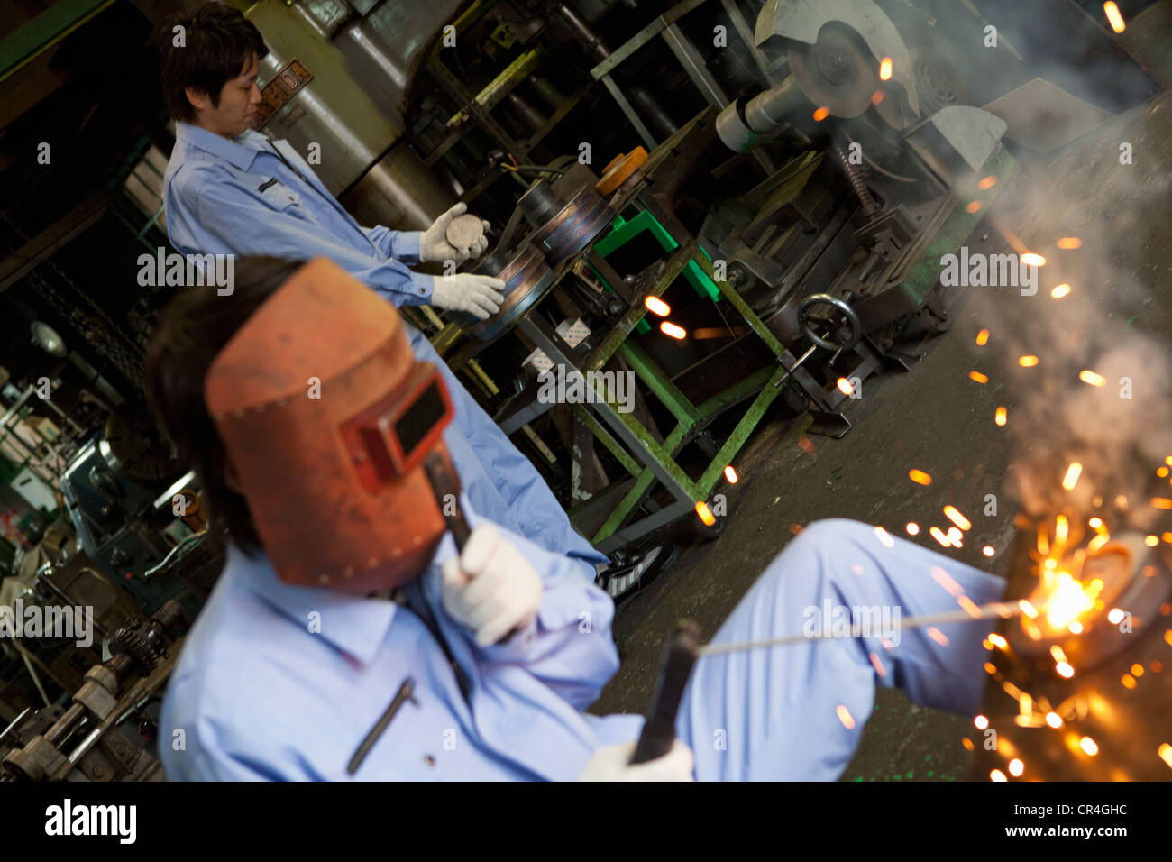 Factory Worker Welding Stock Photo - Alamy