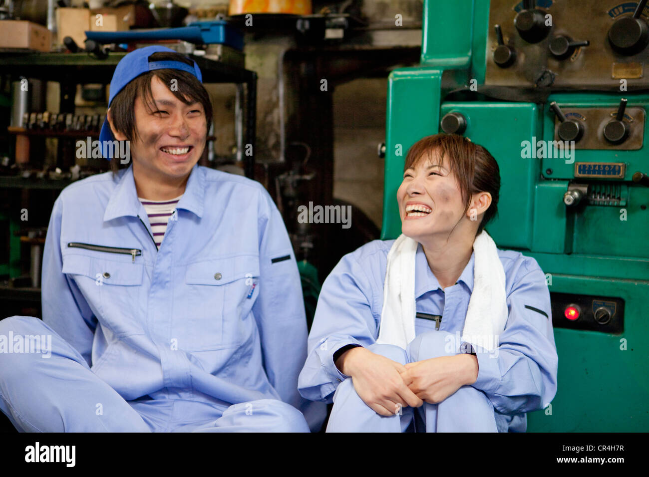 Two Factory Workers Having a Break Stock Photo - Alamy