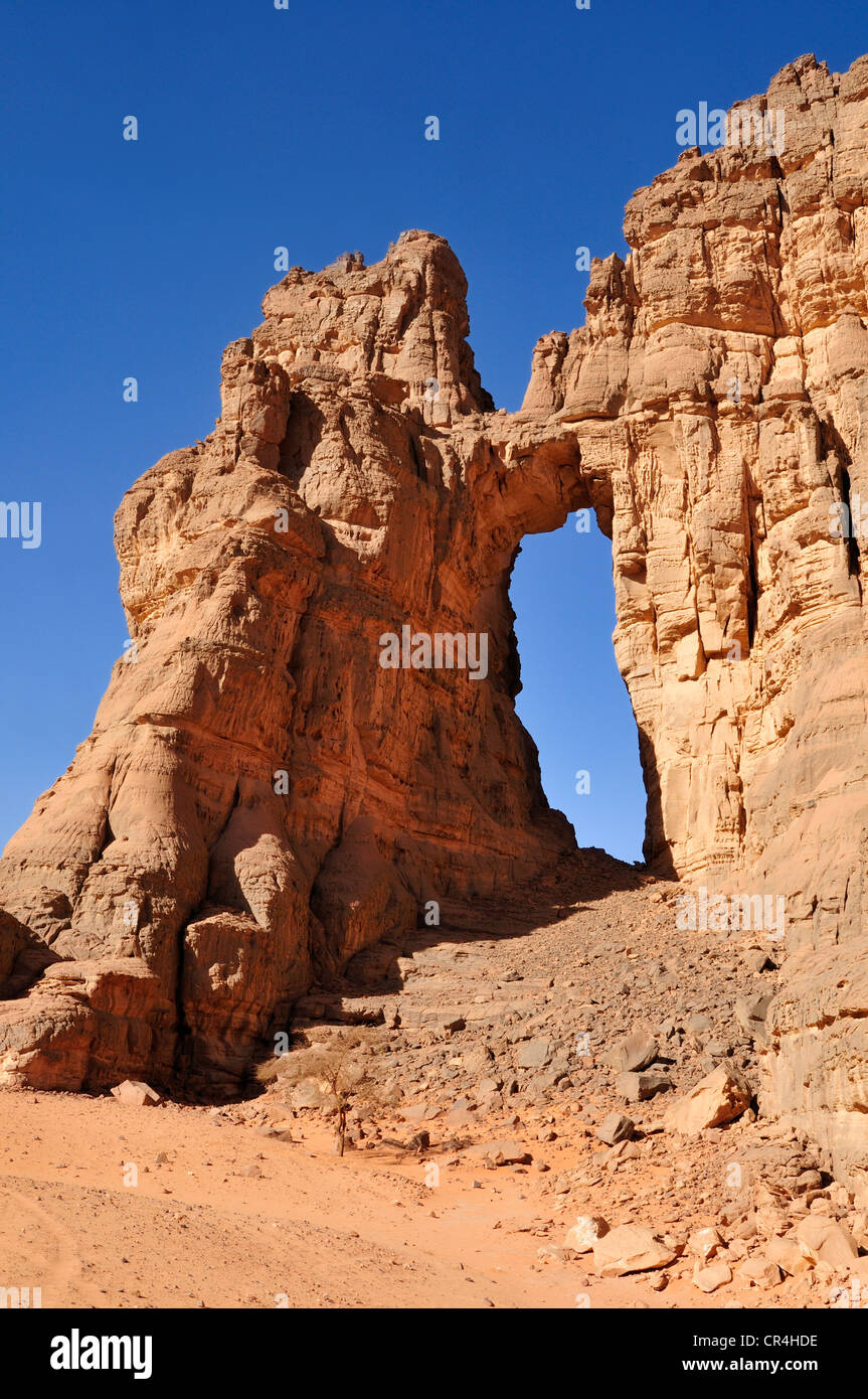 Arch or natural window in the rock formation of La Cathedrale, Acacus ...