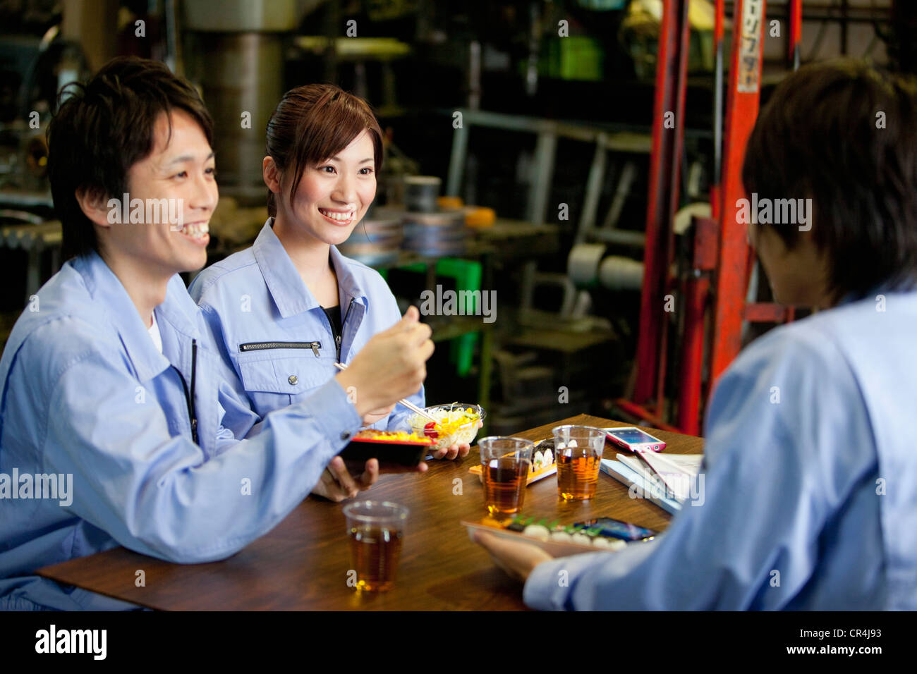 Three Factory Workers Having Lunch Break Stock Photo - Alamy