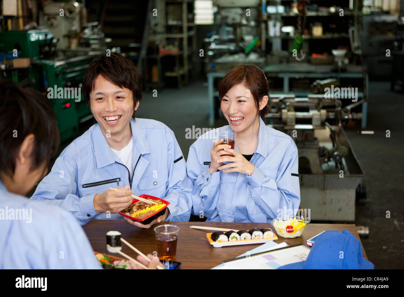Three Factory Workers Having Lunch Break Stock Photo - Alamy