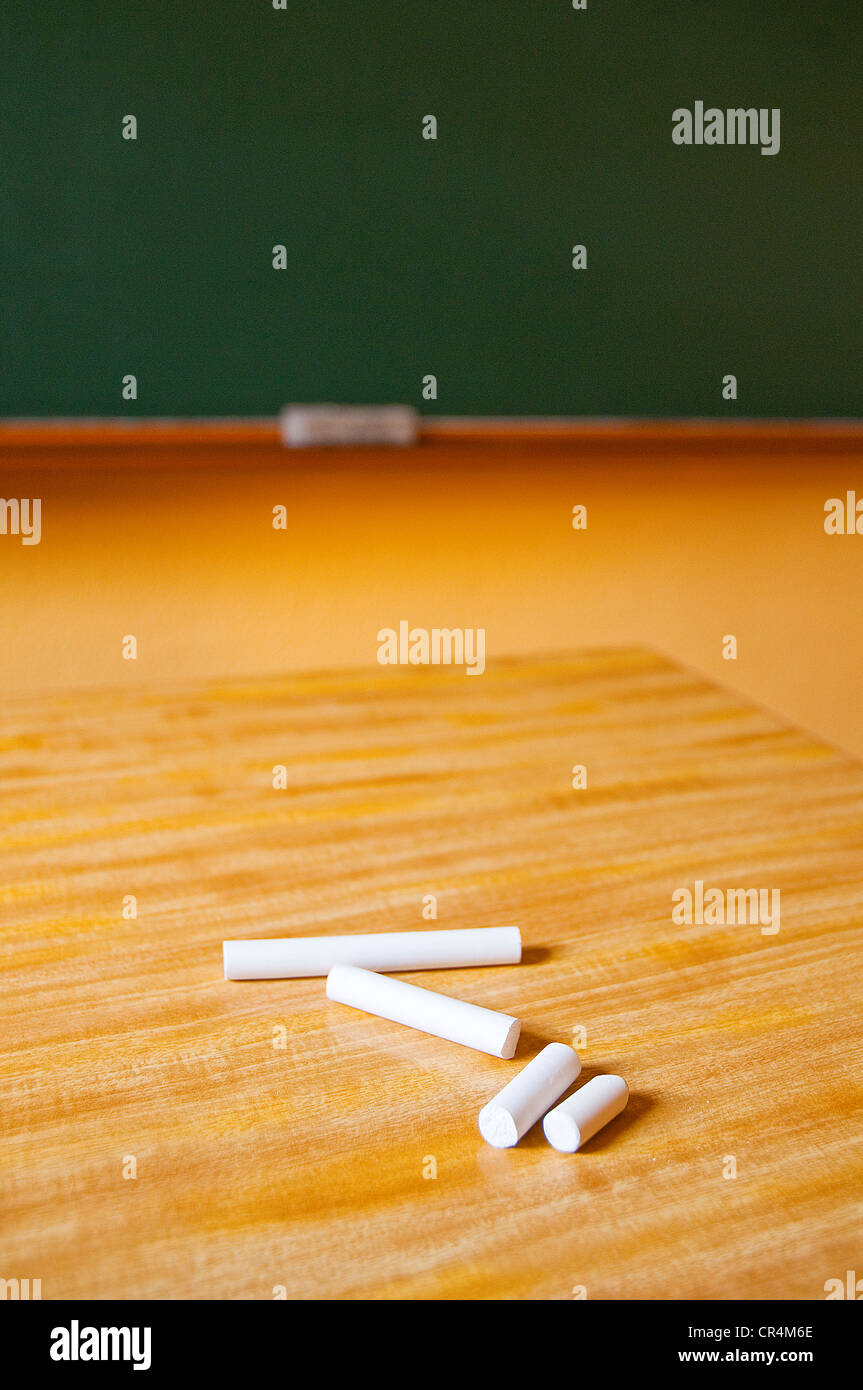 Chalks on teacher's table Stock Photo - Alamy
