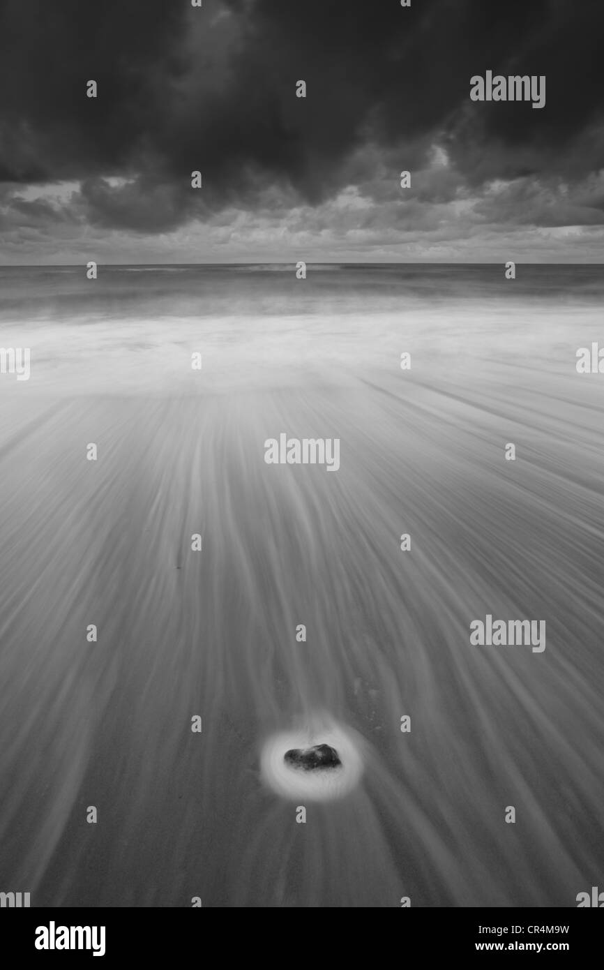 Receding waves at Cart Gap on the Norfolk Coast Stock Photo - Alamy