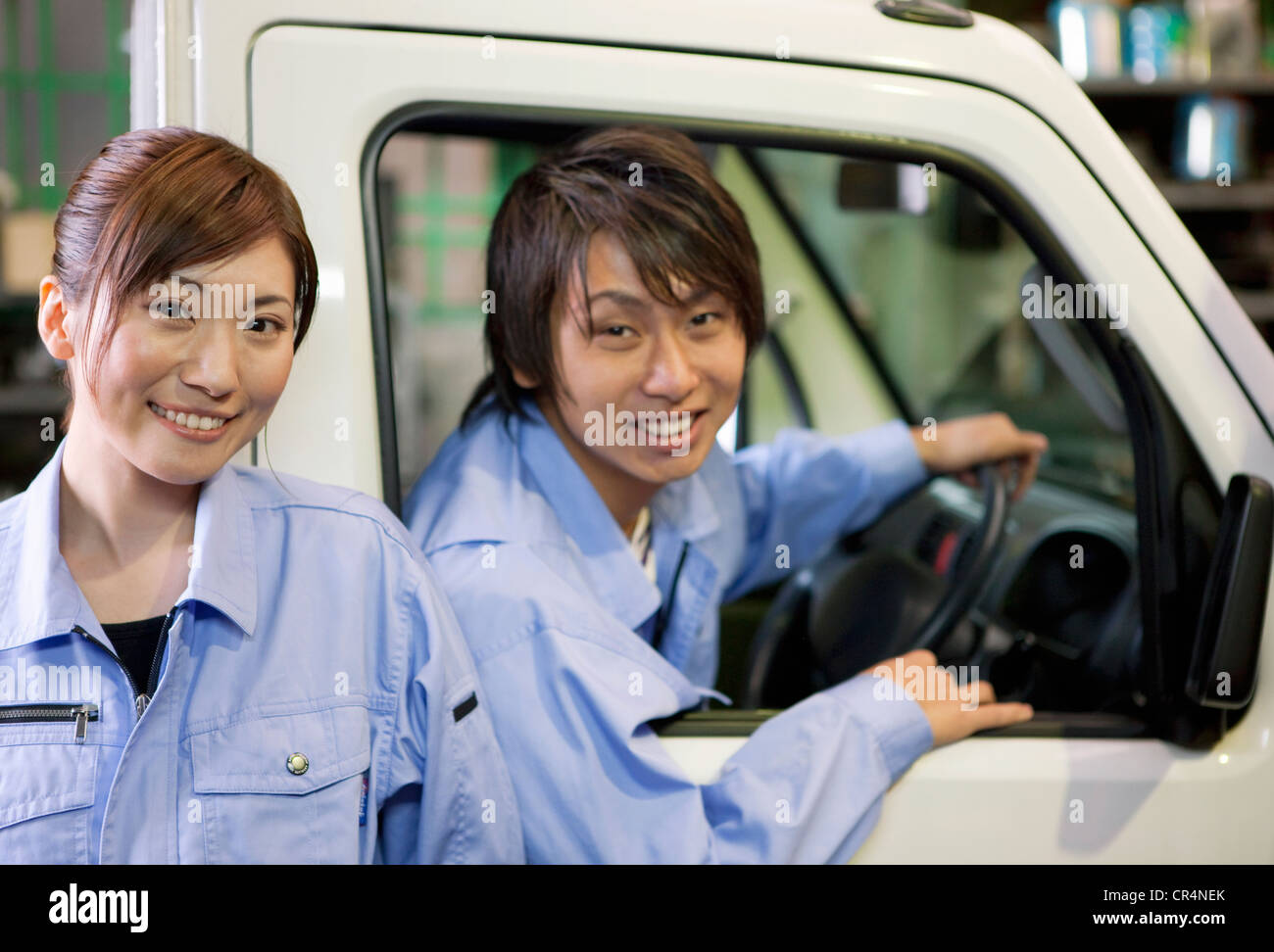 Two Car Mechanics Stock Photo - Alamy