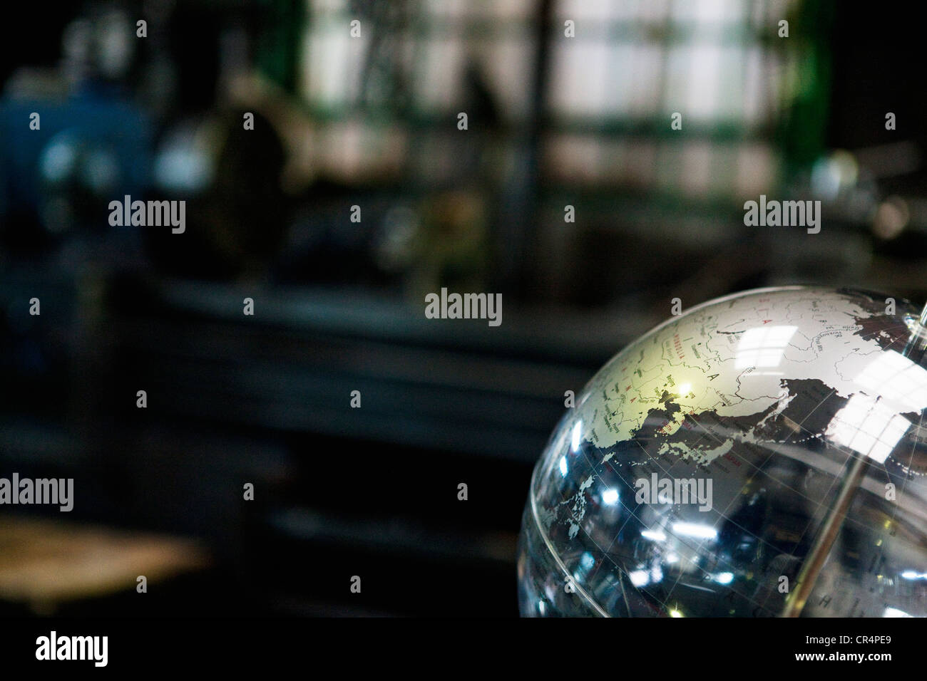 Globe In Factory Stock Photo - Alamy