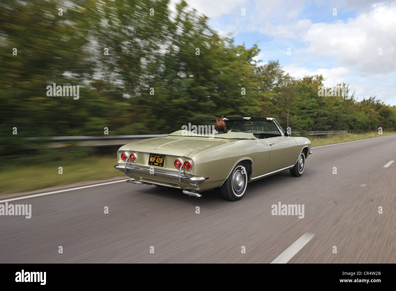 Chevrolet Corvair convertible classic American rear engine car driving ...