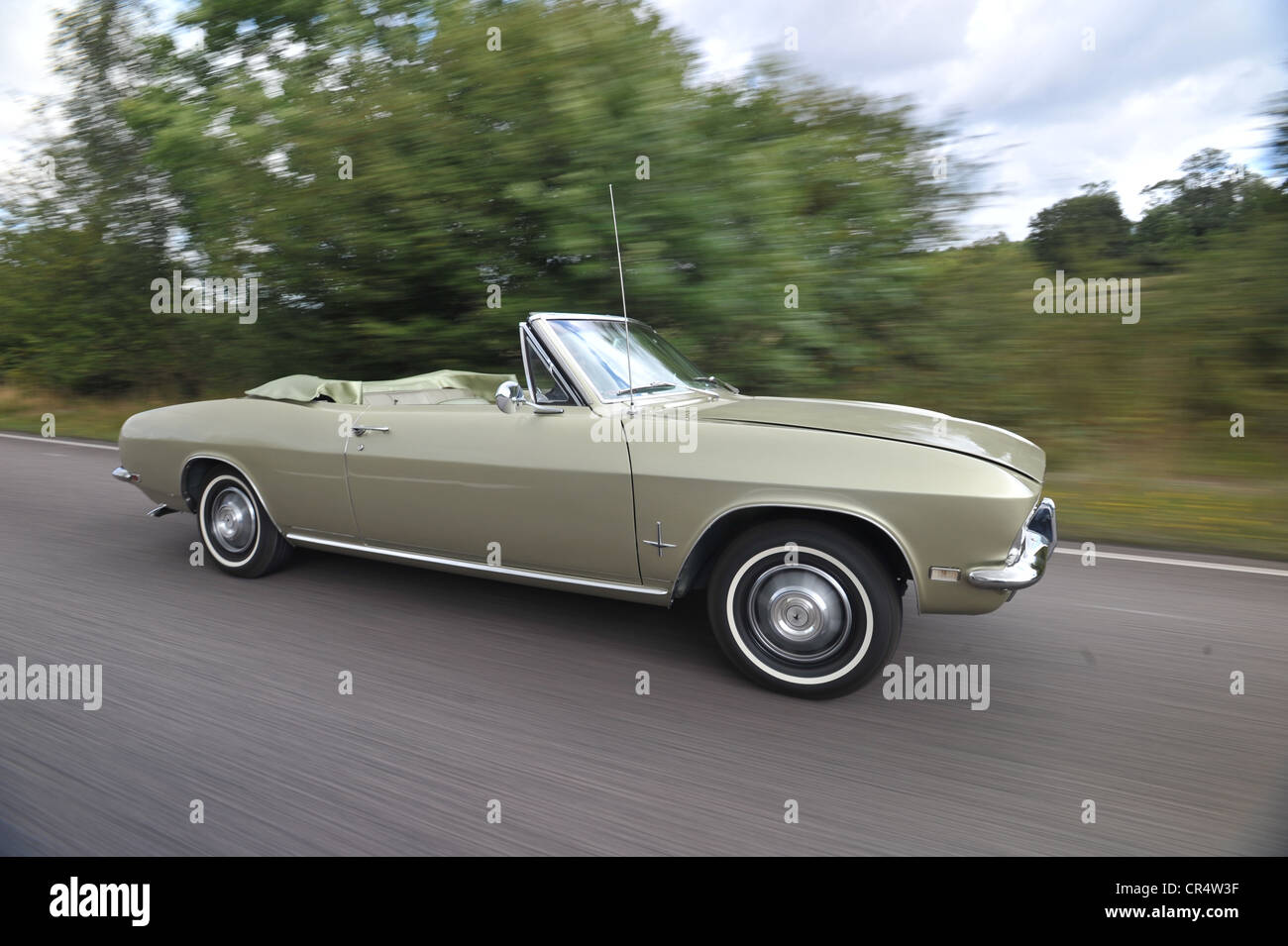 Chevrolet Corvair convertible classic American rear engine car driving ...