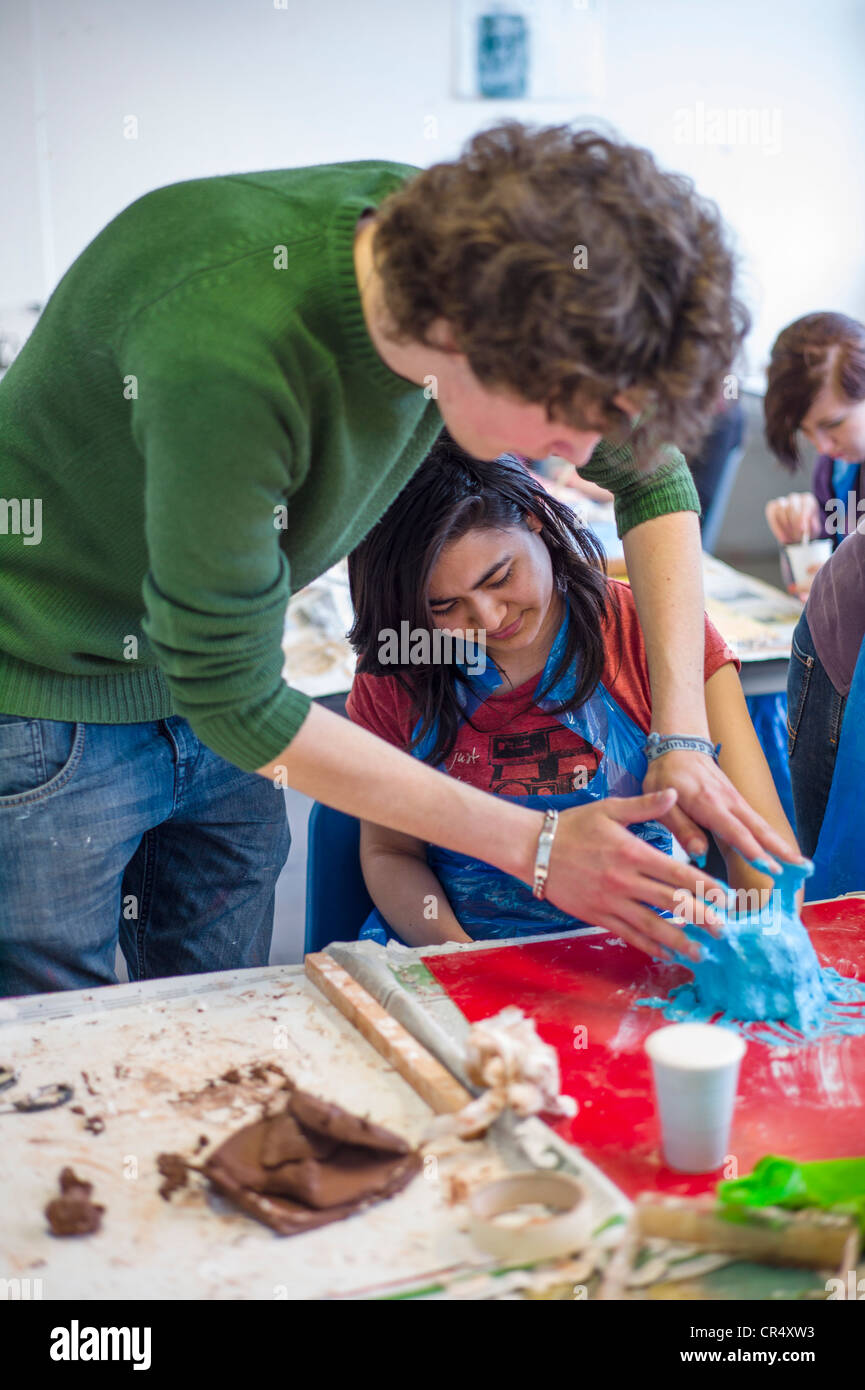 Students attending art class to improve there skills, with a view to ...