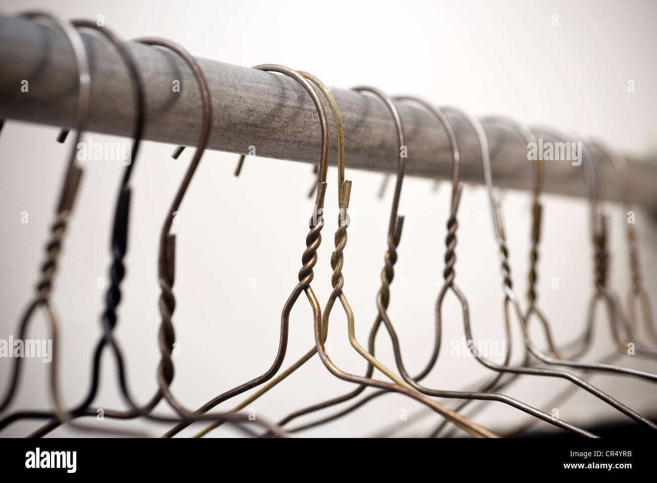 Wire hangers on a rack in New York Stock Photo - Alamy