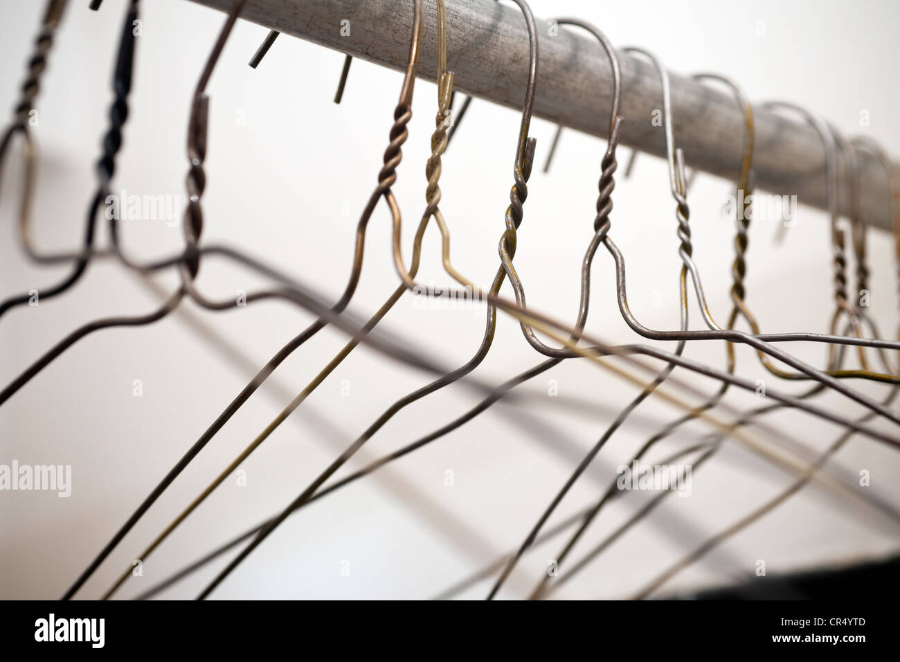 Wire hangers on a rack in New York Stock Photo - Alamy