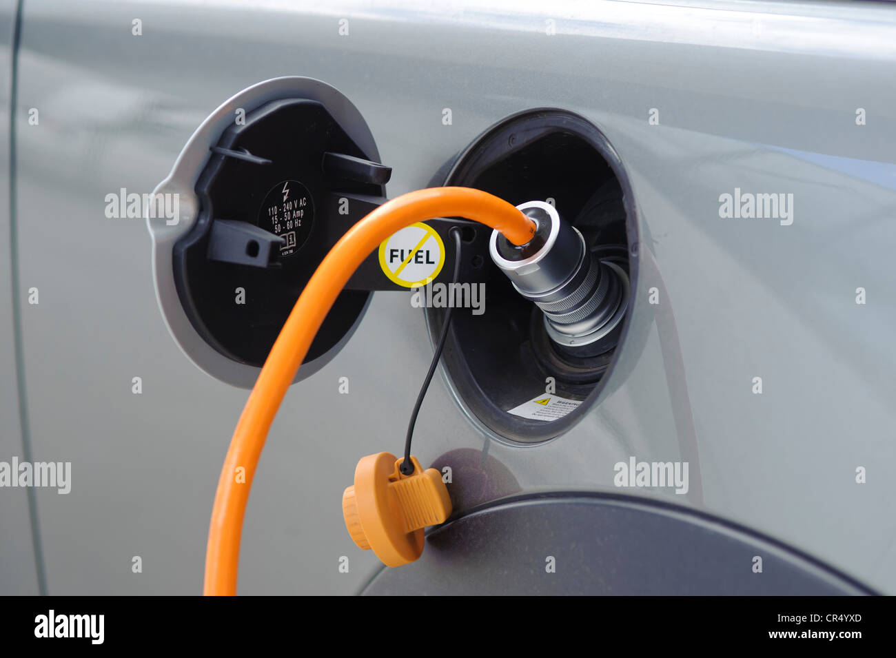 Charging up an electric car at a charging station, Munich, Bavaria ...