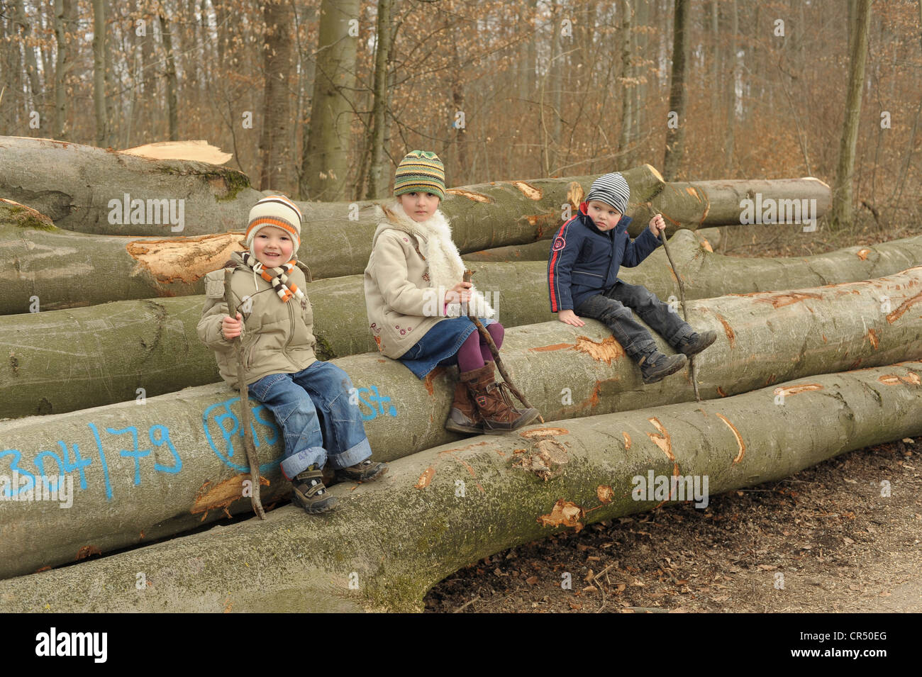 Children between years sitting sticks hi-res stock photography and ...