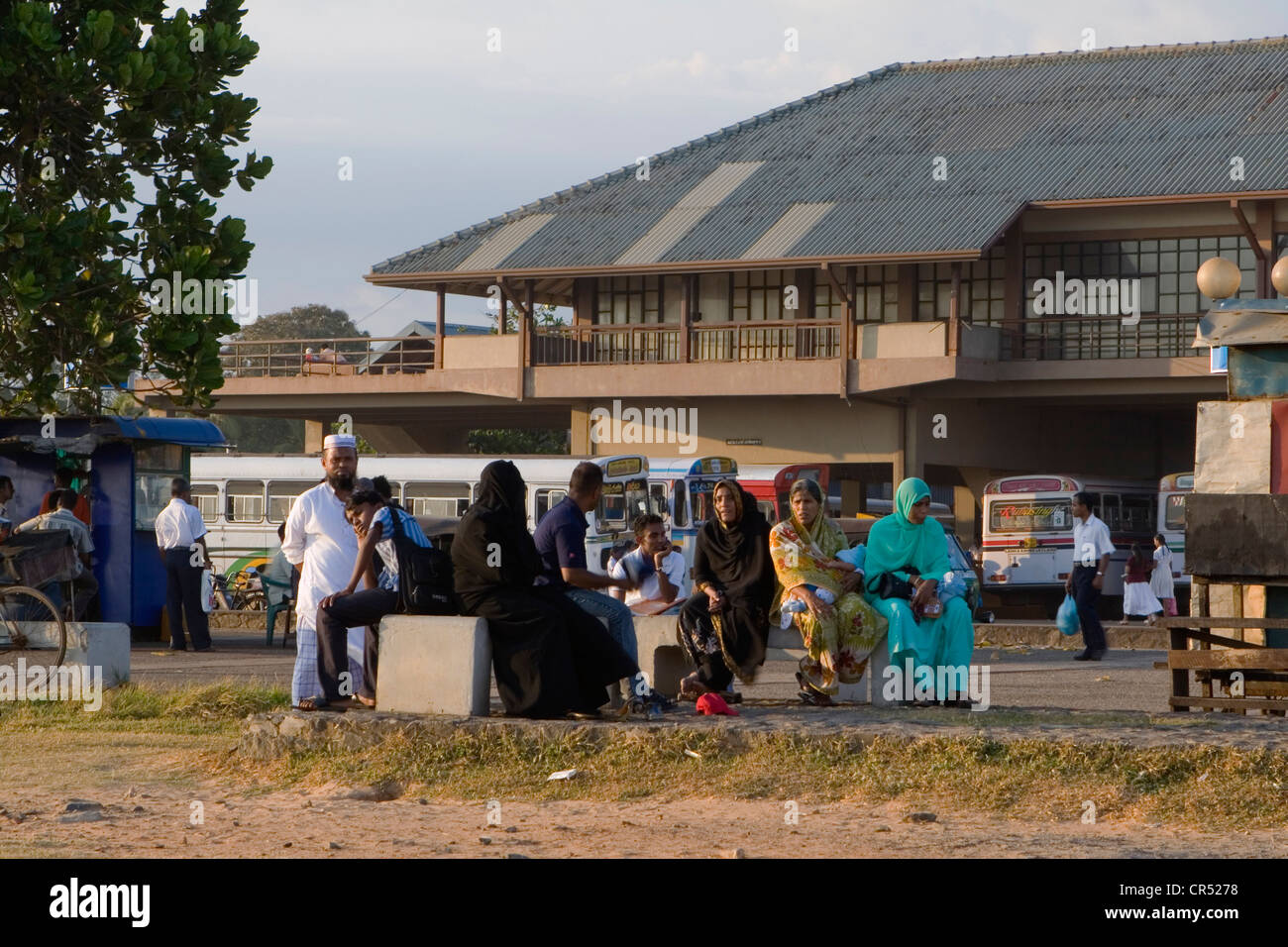Muslim group waiting outside Matara bus station, Sri Lanka Stock Photo ...